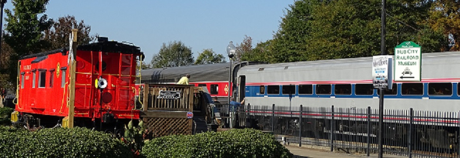 Amtrak excursion train at the Hub City RR Museum caboose | Hub City Railroad Museum